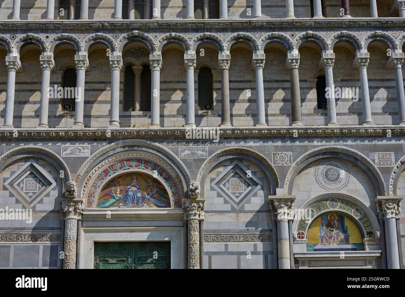 Photo of the medieval romanesque arcades on the fascade of the ...