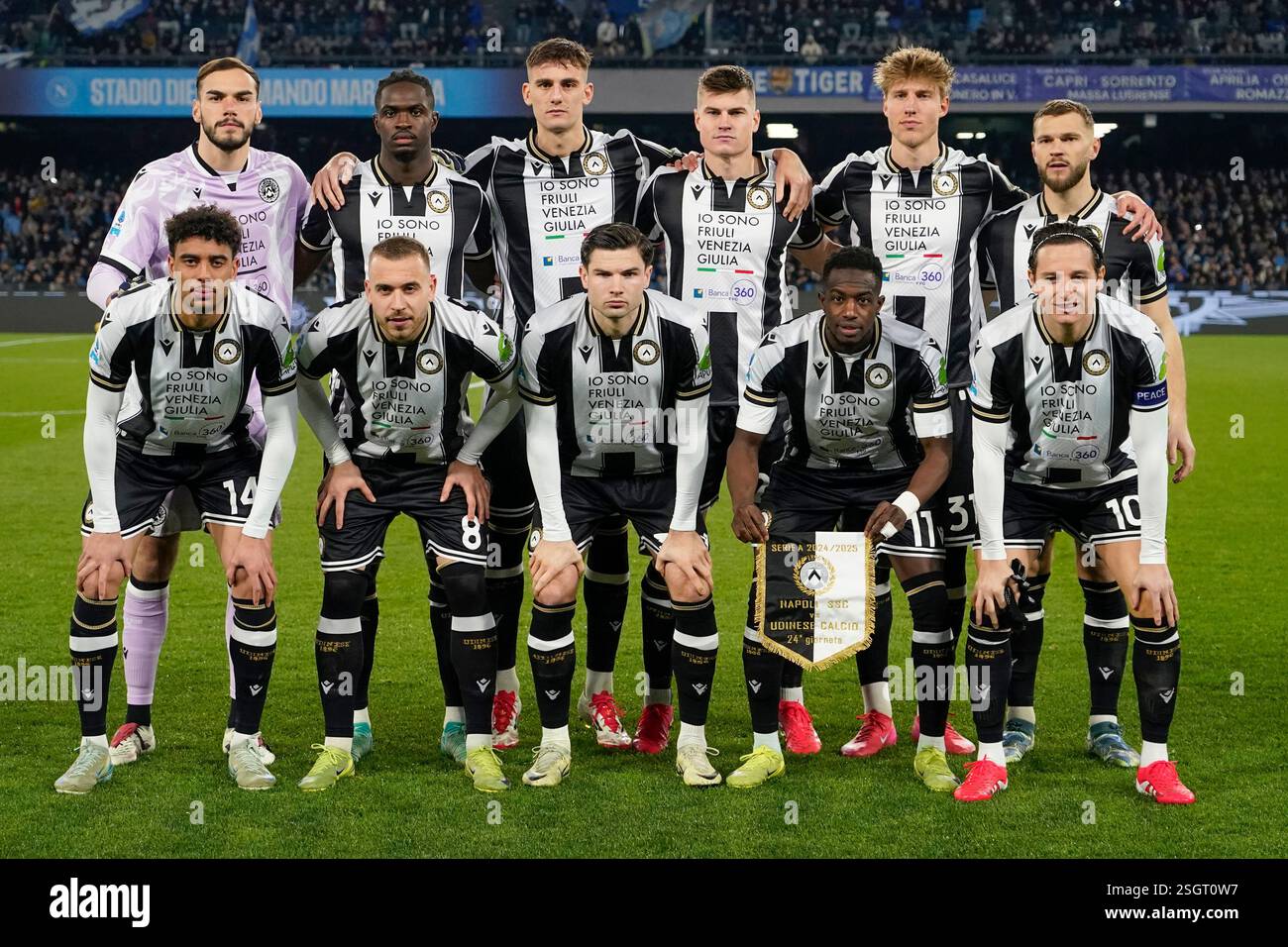 Naples, Italy. 9 Feb, 2025. Players of Udinese Calcio line up for a team photo during the Serie ...