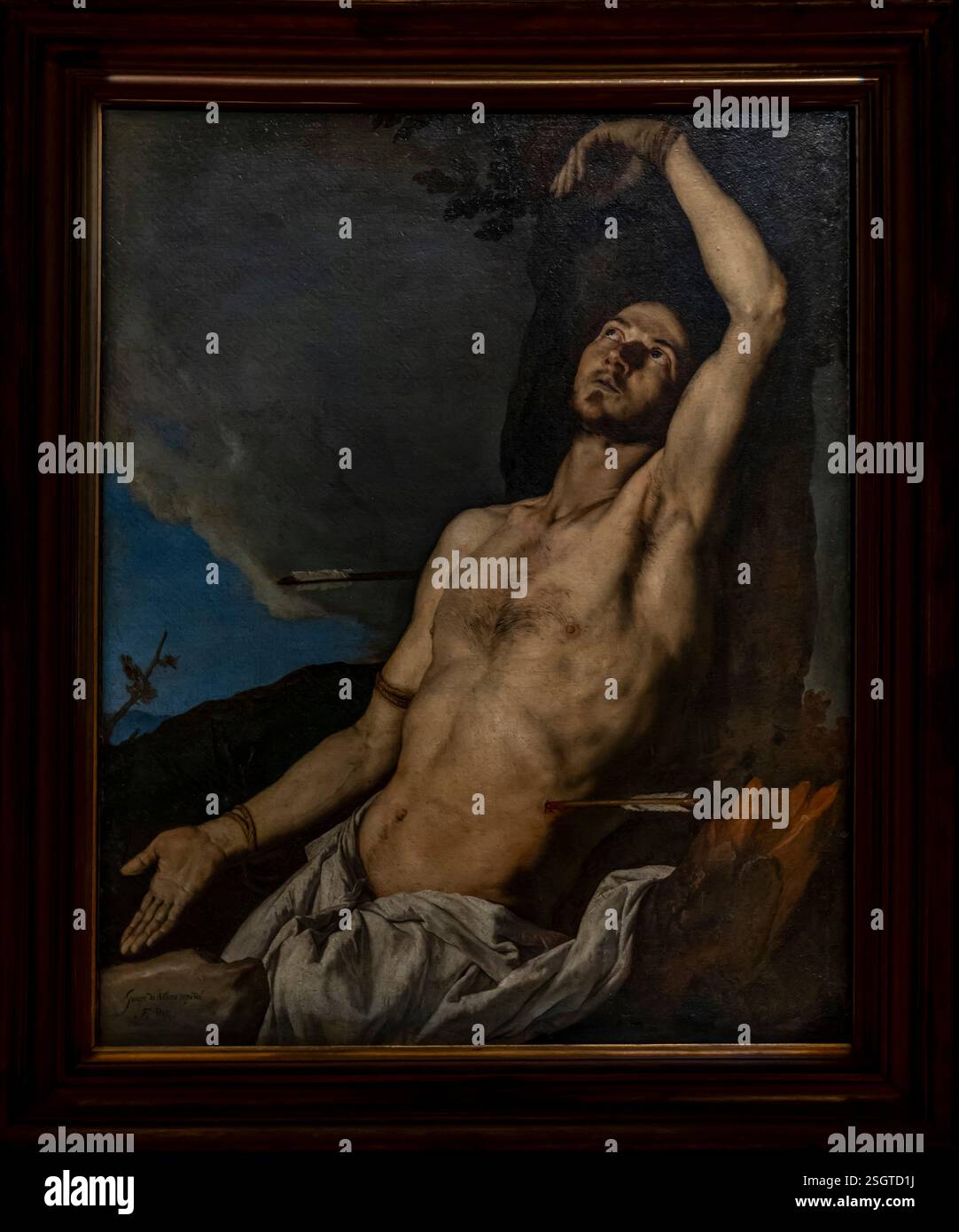 Paris, France - 02 09 2025: Darkness and light. Saint Sebastian painted ...