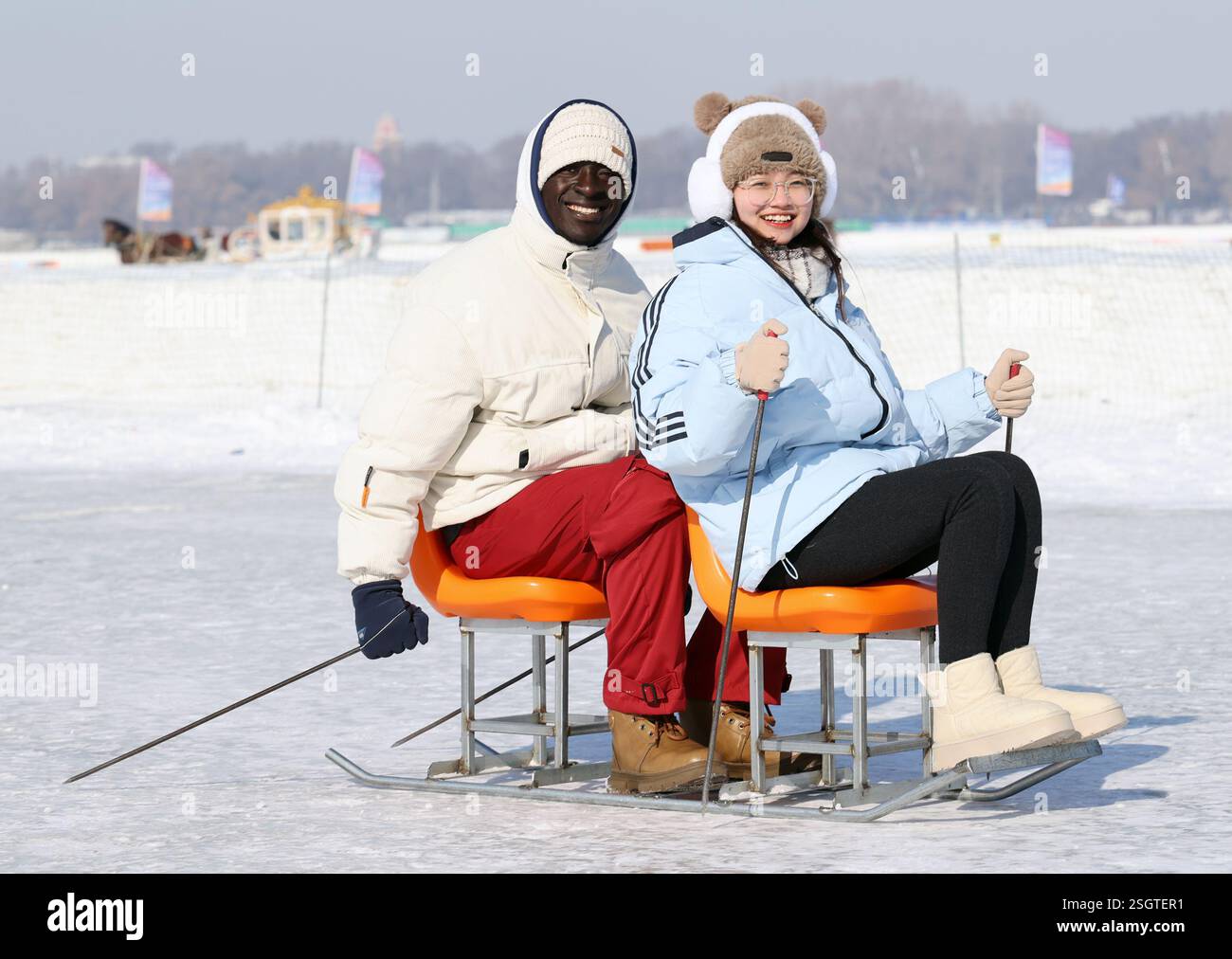 Harbin, China's Heilongjiang Province. 9th Feb, 2025. Paul Kofei (L ...