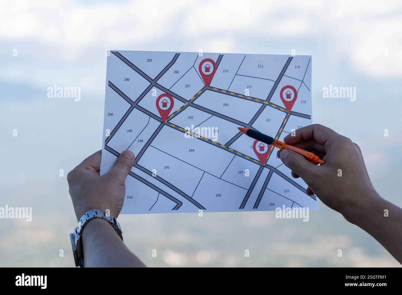 Hands holding travel guide hi-res stock photography and images - Alamy