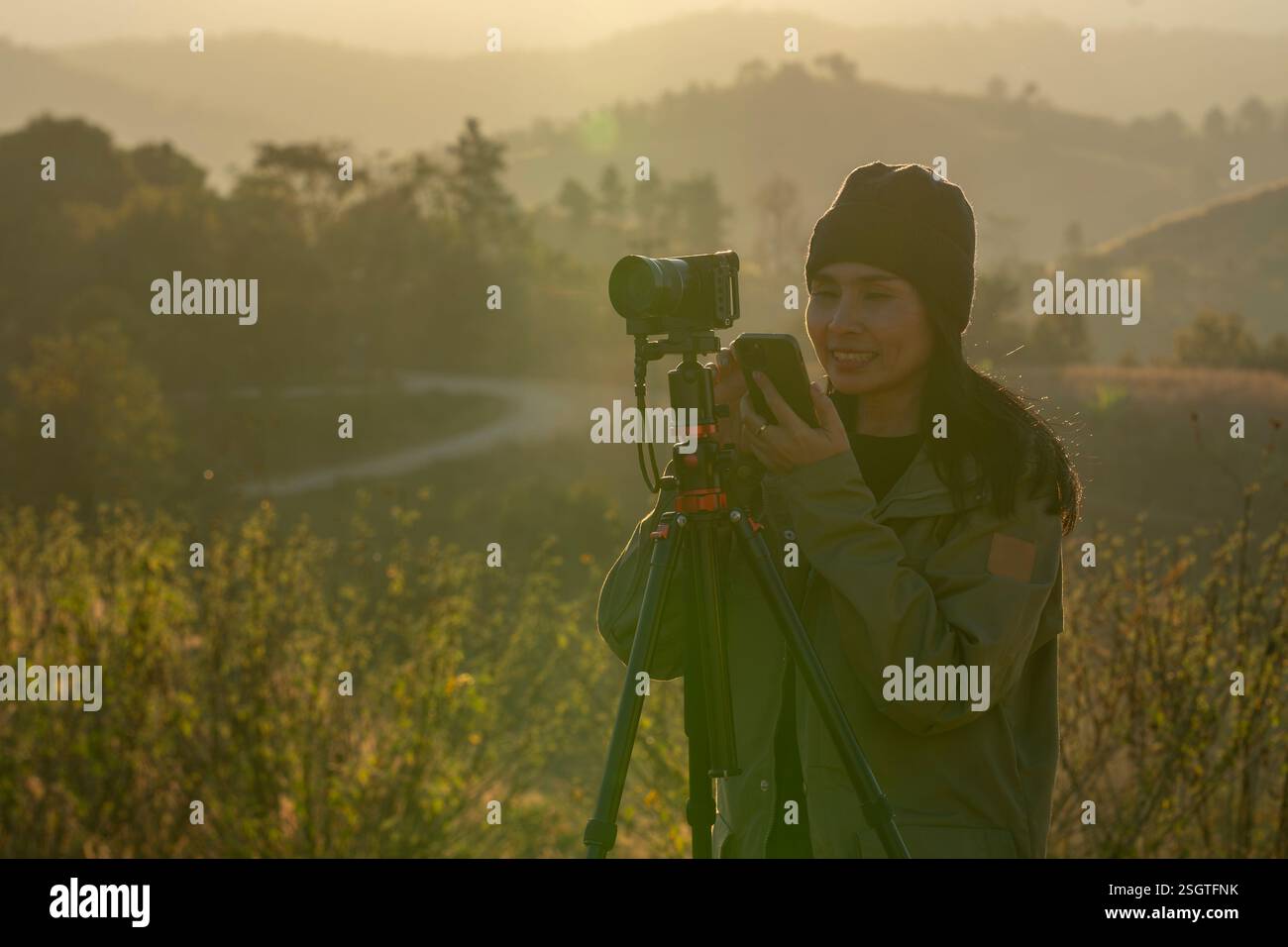 Female travel photographer standing hi-res stock photography and images ...