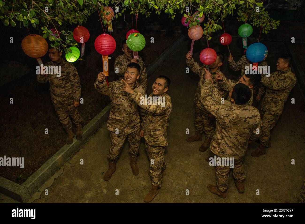 Officers and soldiers solve lantern riddles to celebrate the upcoming ...