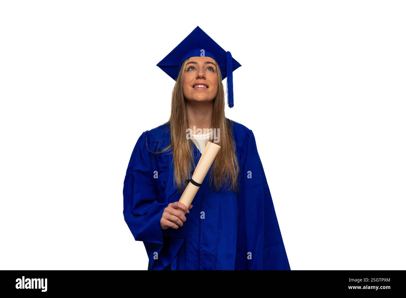 Portrait of a hopeful graduate student looking up, wearing blue gown ...