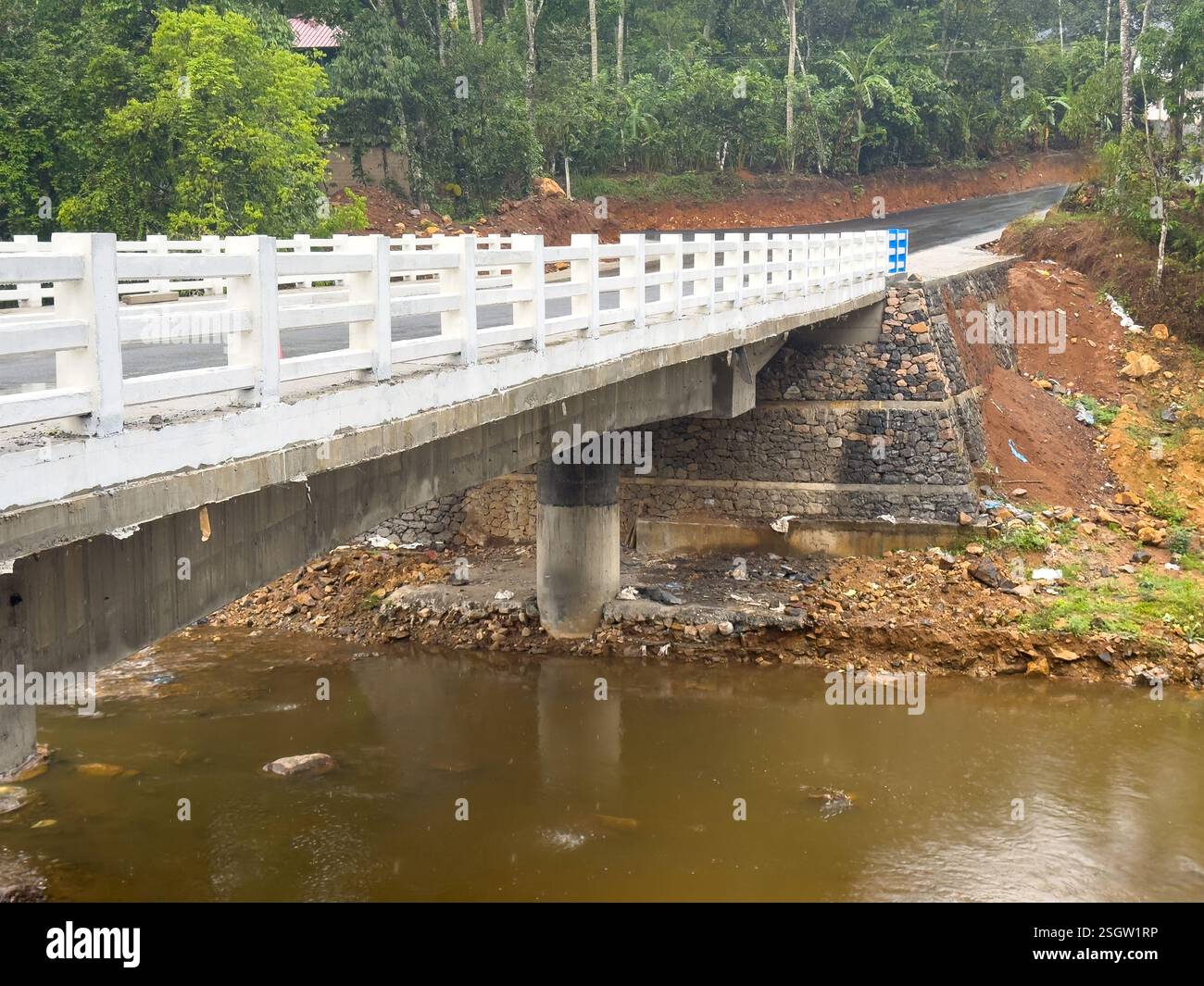 A highway bridge across the scenic Muthirapuzha River near Munnar ...