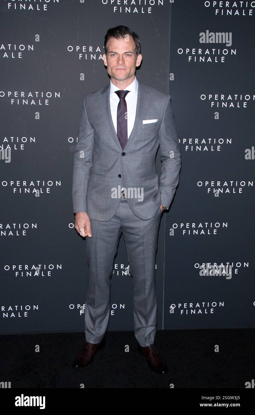 Actor Torben Liebrecht arriving at the premiere of 'Operation Finale ...