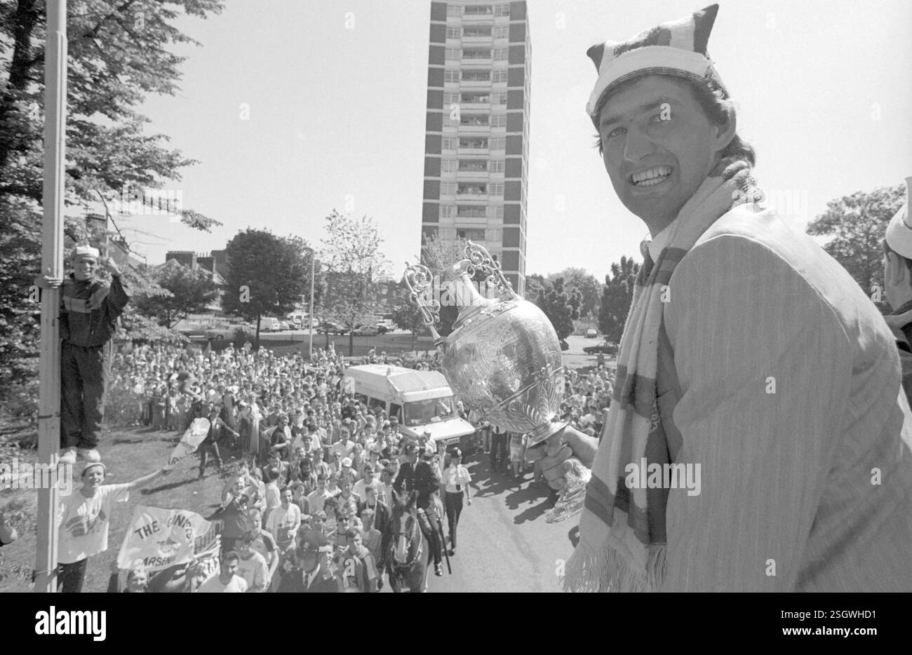 Arsenal captain Tony Adams with the league trophy on the open top bus ...