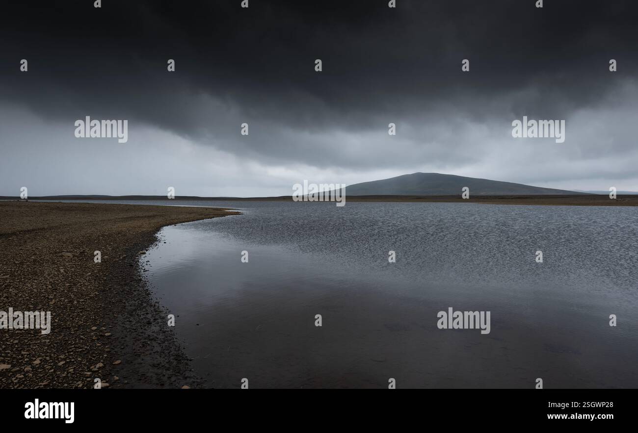 Stunning Icelandic landscape with mountains, waterfalls, and dramatic ...