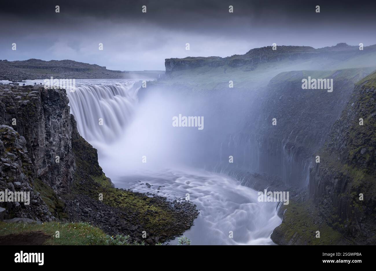 Stunning Icelandic landscape with mountains, waterfalls, and dramatic ...