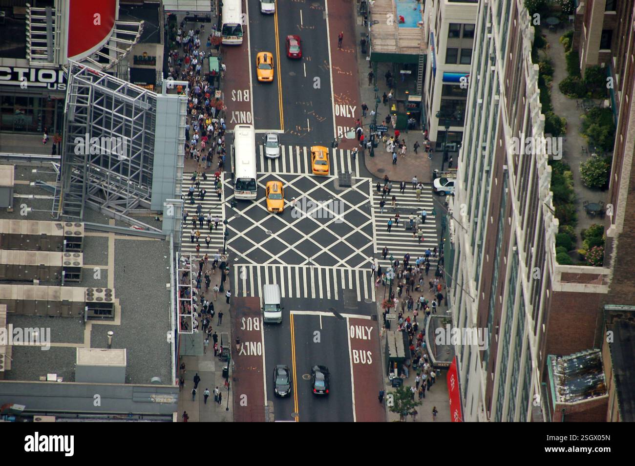 Aerial view of a busy New York City street with yellow taxis, buses ...