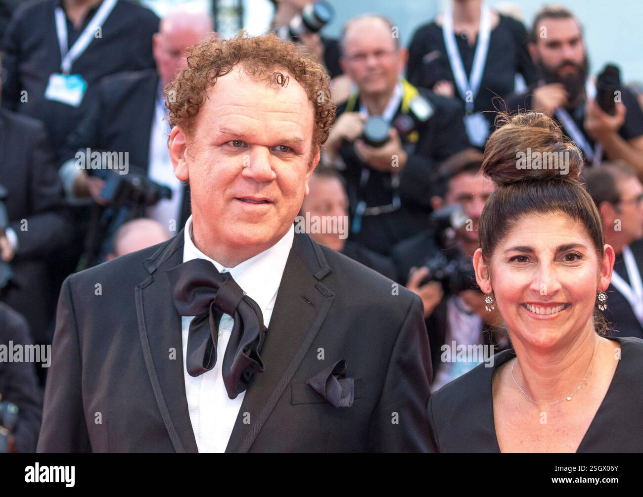 John C. Reilly and Alison Dickey attend the premiere of 'The Sisters ...