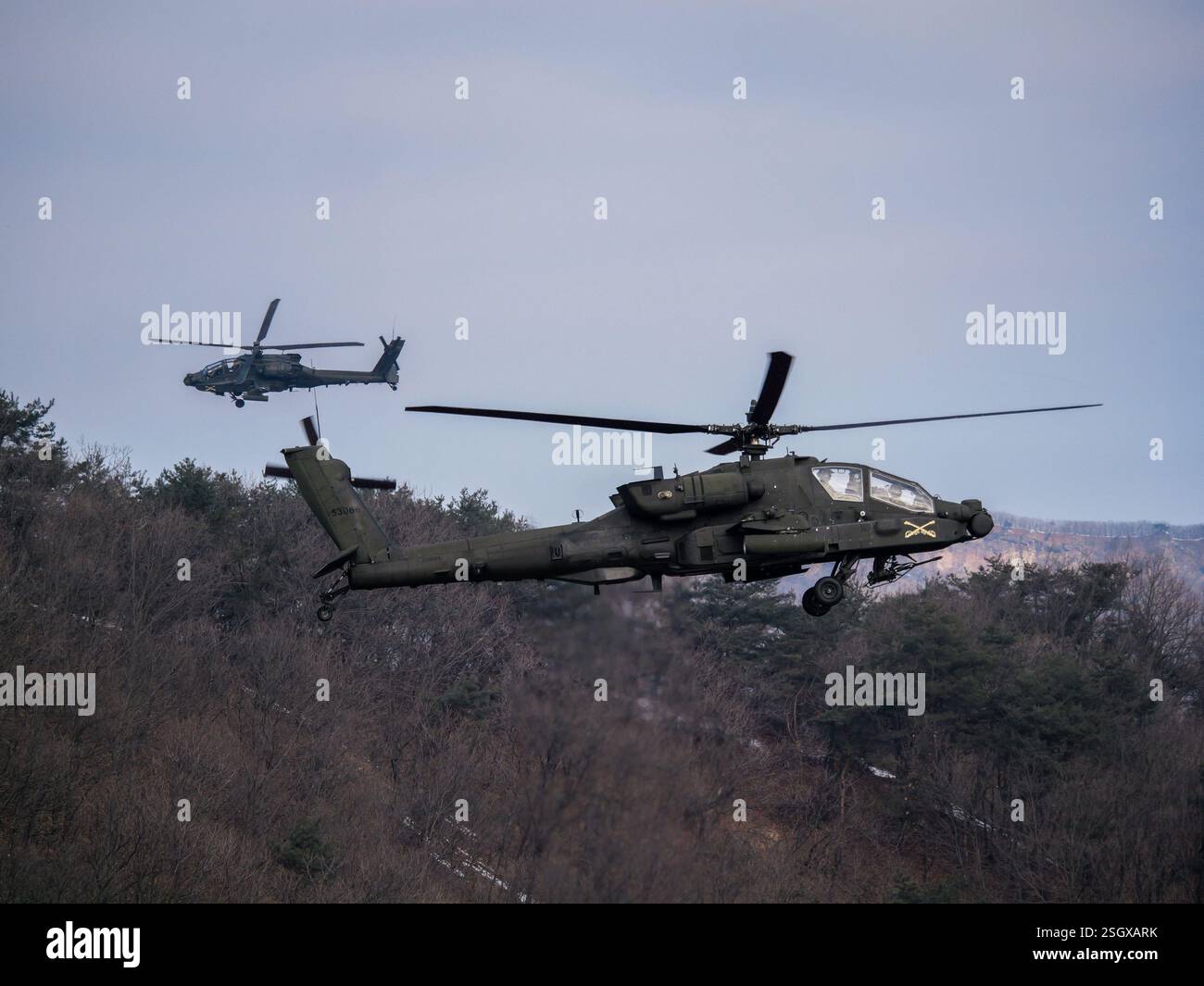Pocheon, South Korea. 09th Feb, 2025. A pair of U.S. AH-64 Apache ...