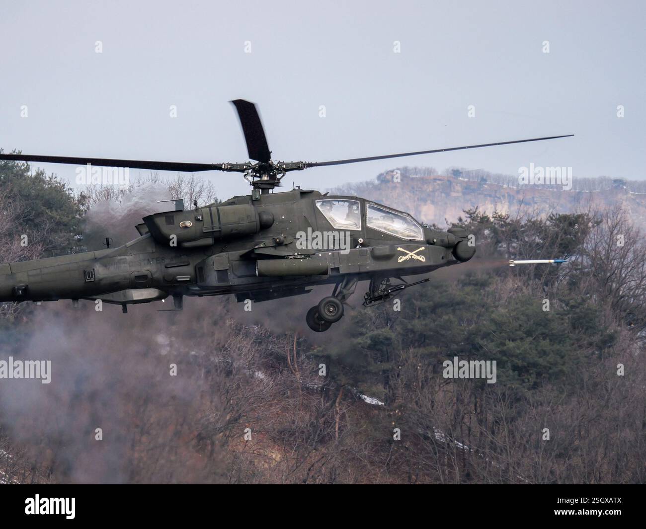 Pocheon, South Korea. 09th Feb, 2025. An AH-64 Apache helicopter fires ...