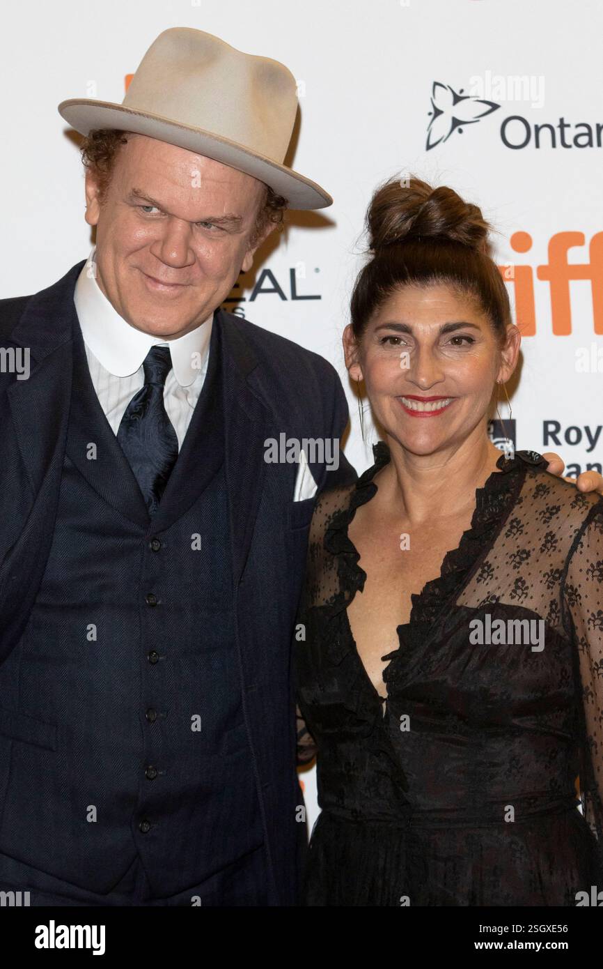 John C. Reilly and Alison Dickey attend the premiere of 'The Sisters ...