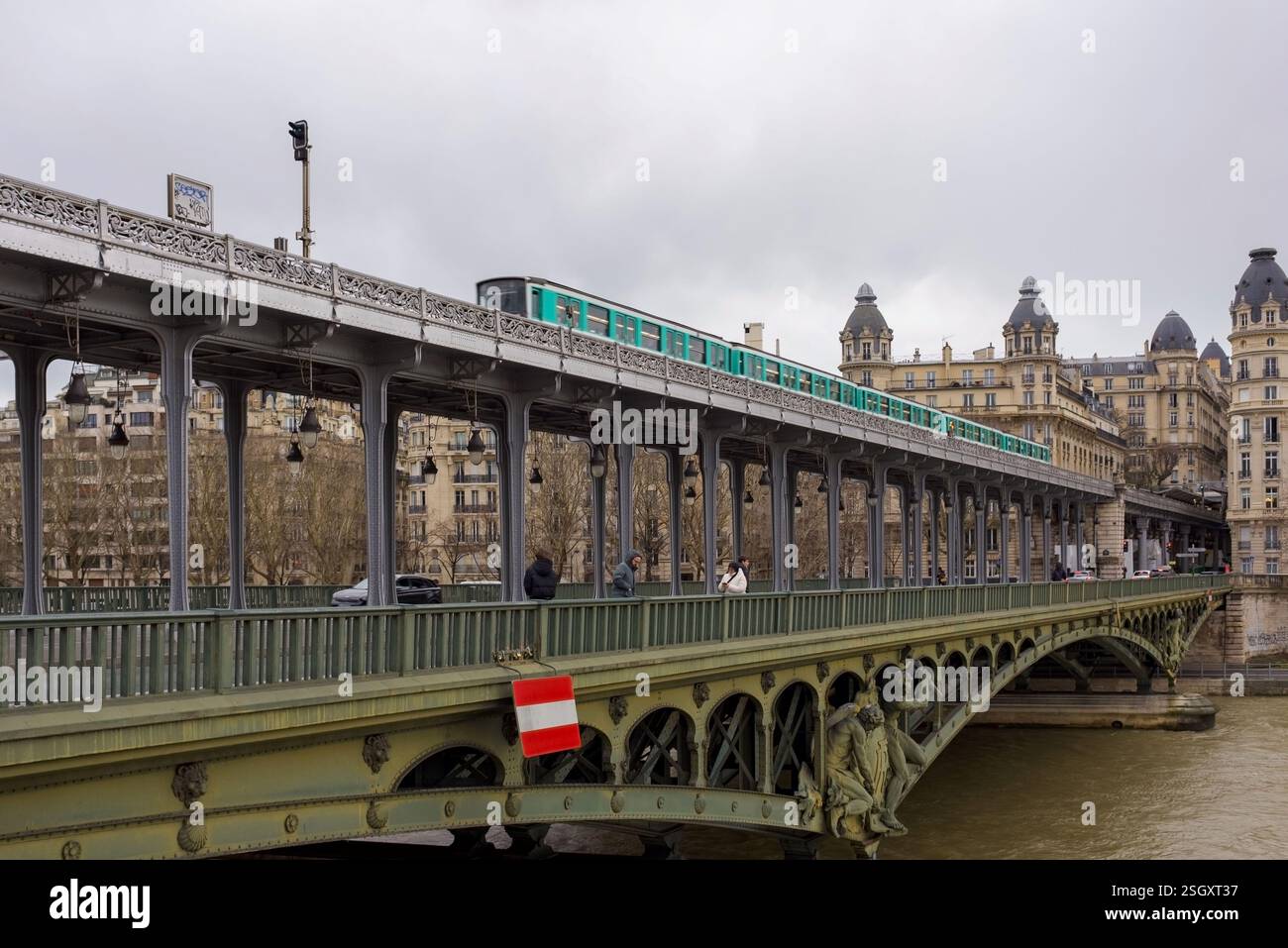 Bir Hakeim bridge. A metro train passing on the famous Bir Hakeim ...