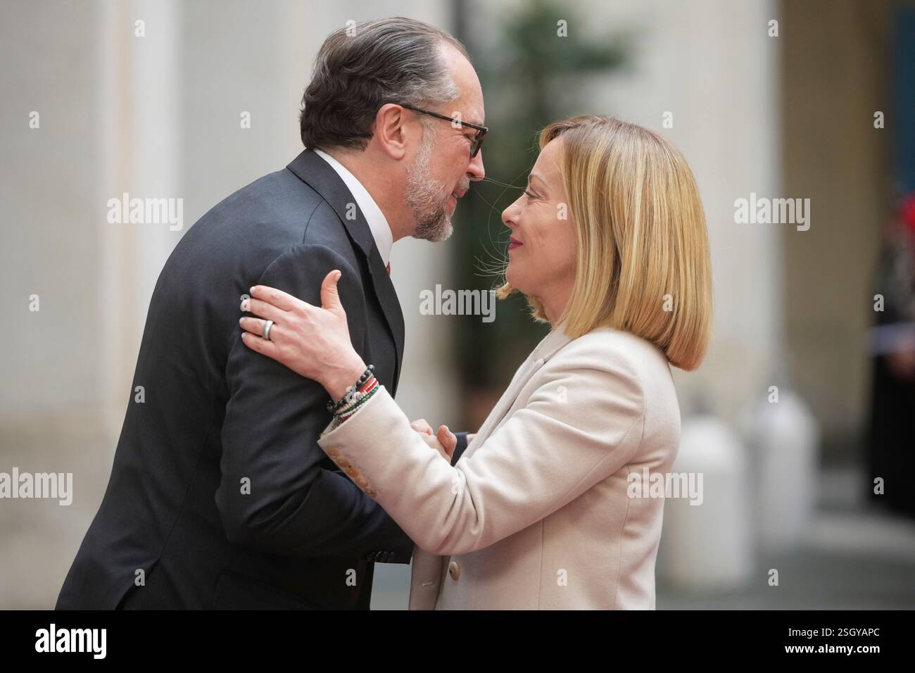 Italy's Prime Minister Giorgia Meloni, right, welcomes Austria's ...
