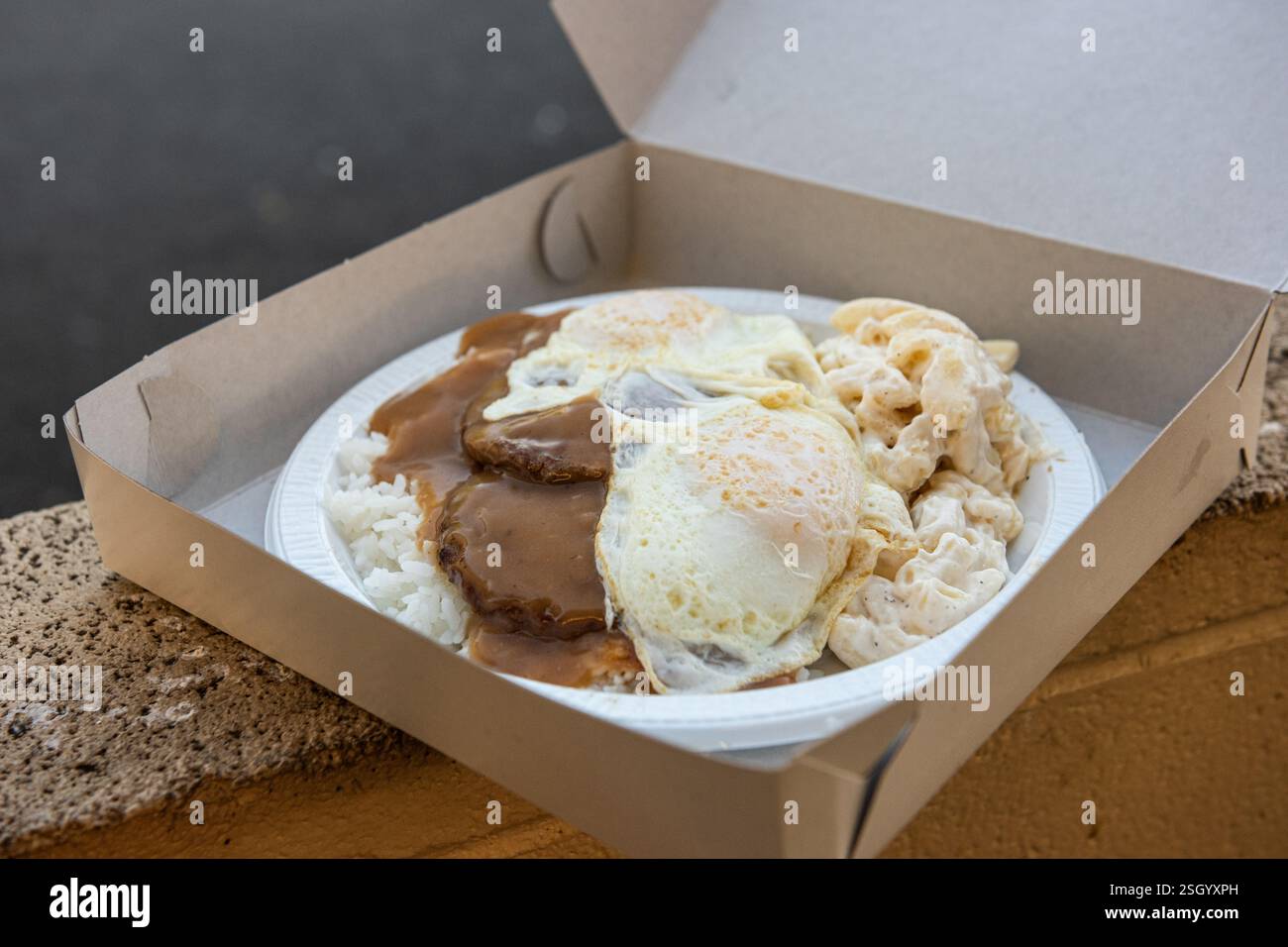Loco moco plate - a Hawaiian dish of steamed rice, hamburger patty ...