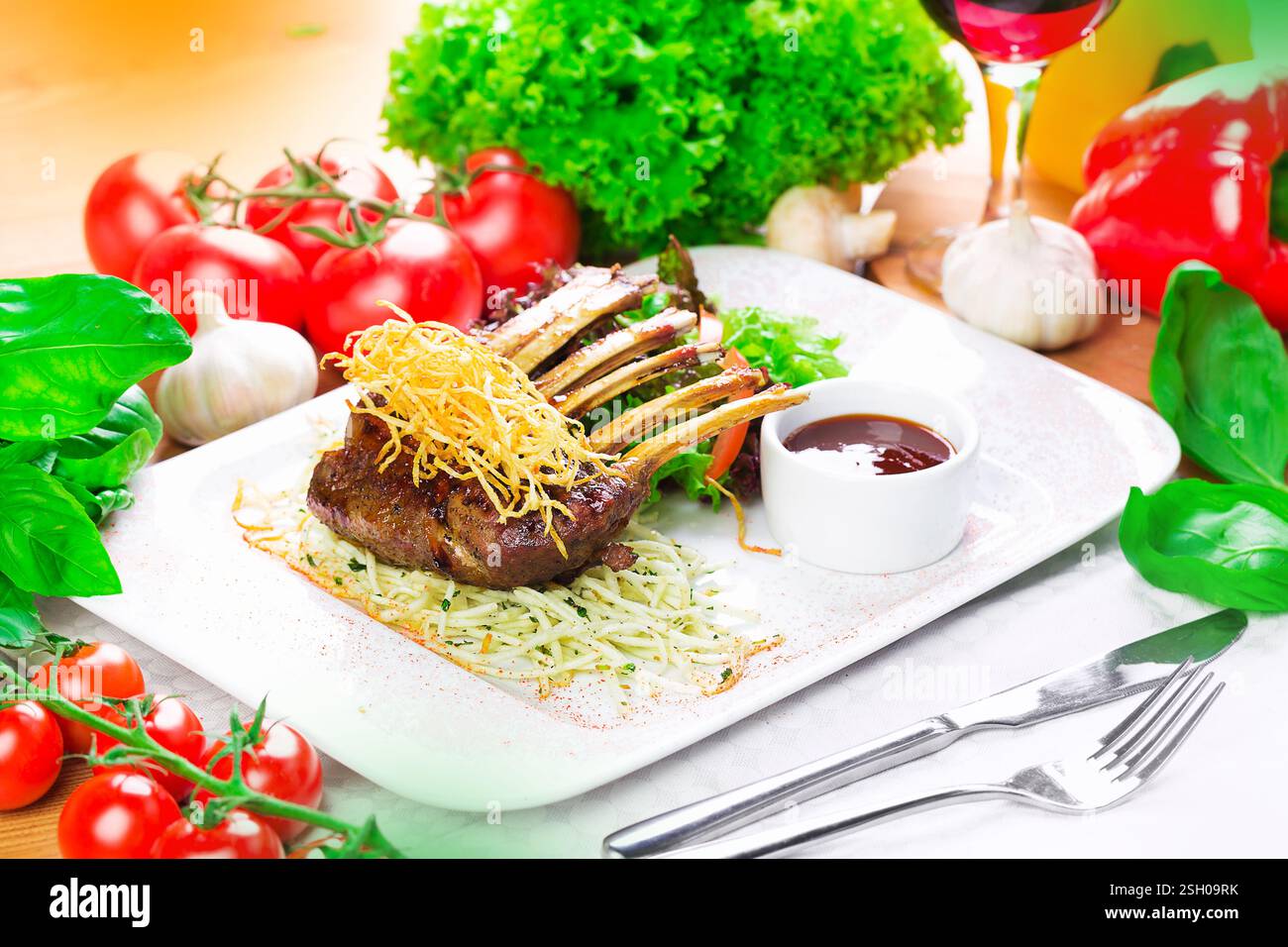 Exquisite lamb chop dish served with fresh vegetables on a classic ...