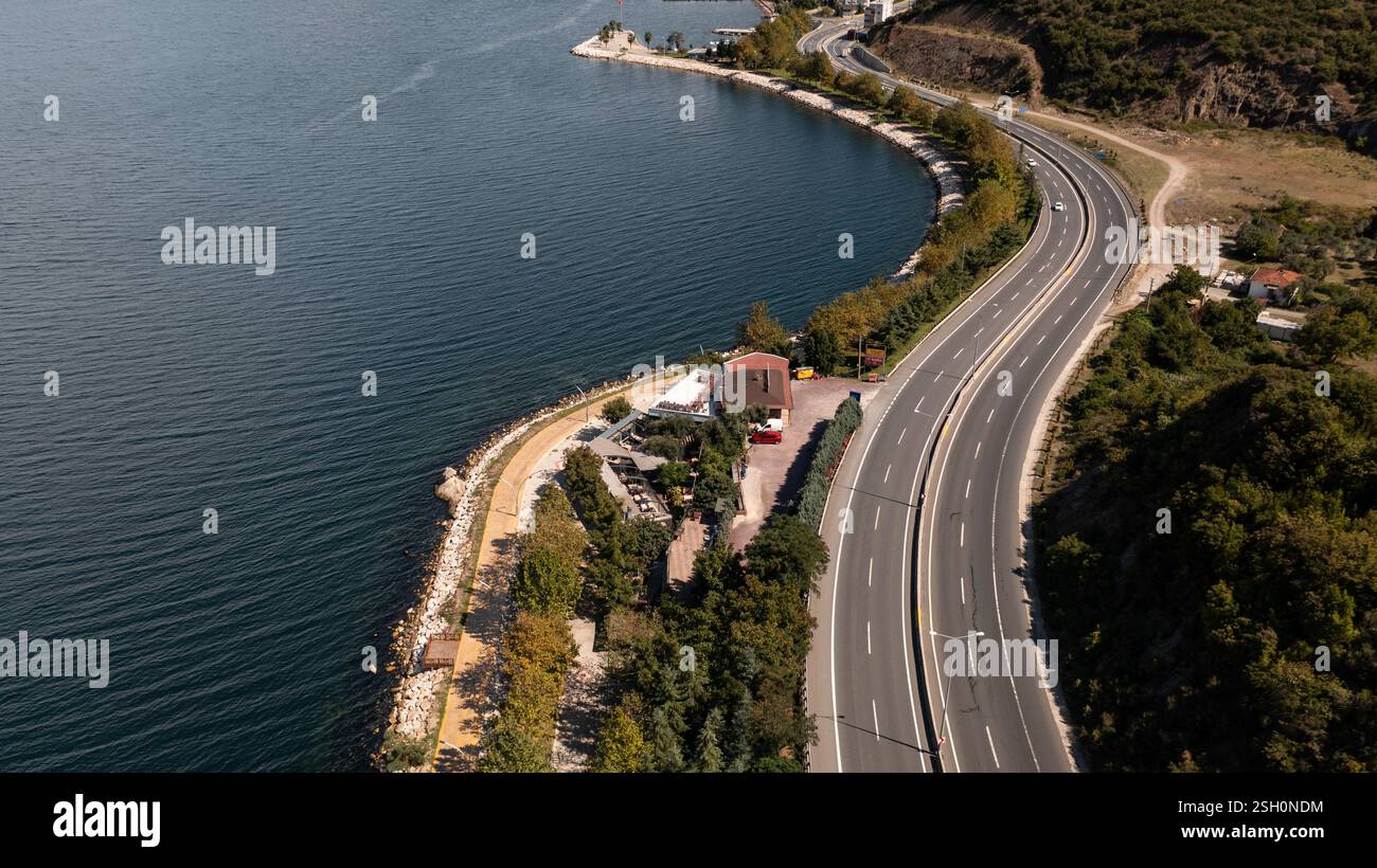Aerial view of newly built highway by the sea Stock Photo - Alamy