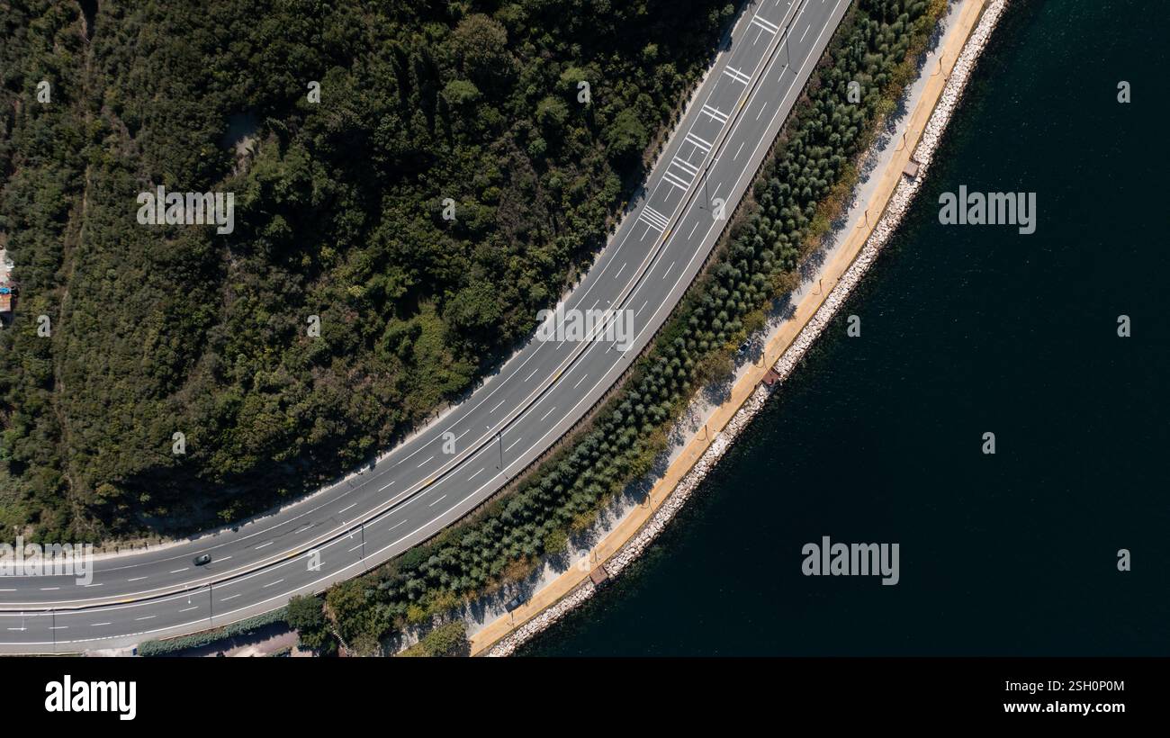 Aerial view of newly built highway by the sea Stock Photo - Alamy