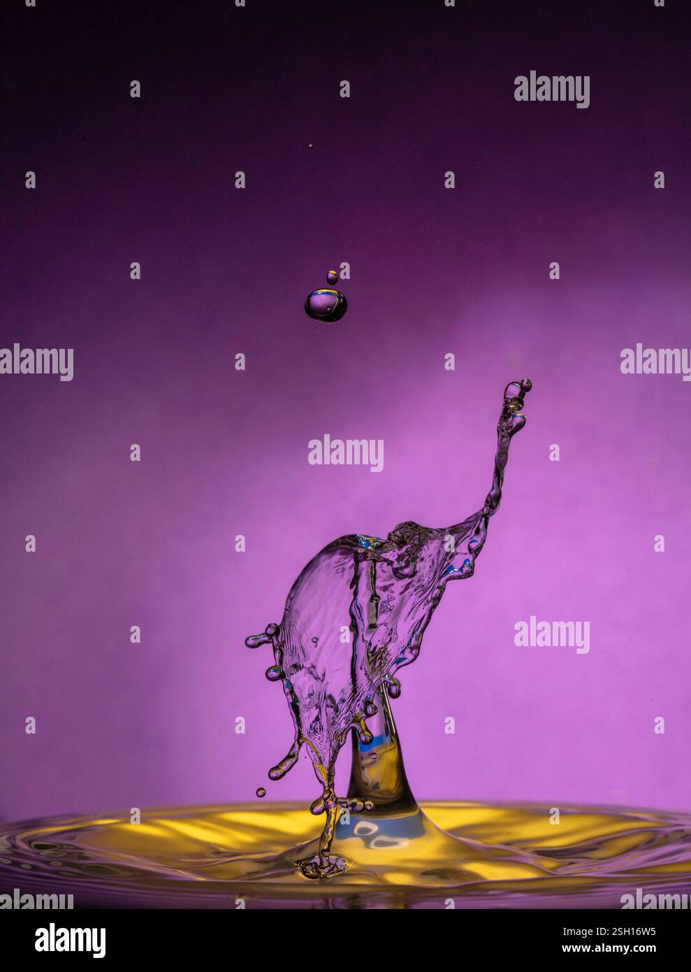 Arresting, ethereal, colour infused, imaginative water collision, macro ...