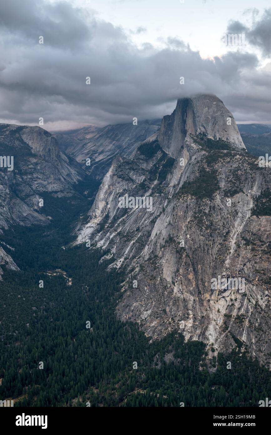 Sunset on Half Dome, as seen from Glacier Point. The tip of half dome ...