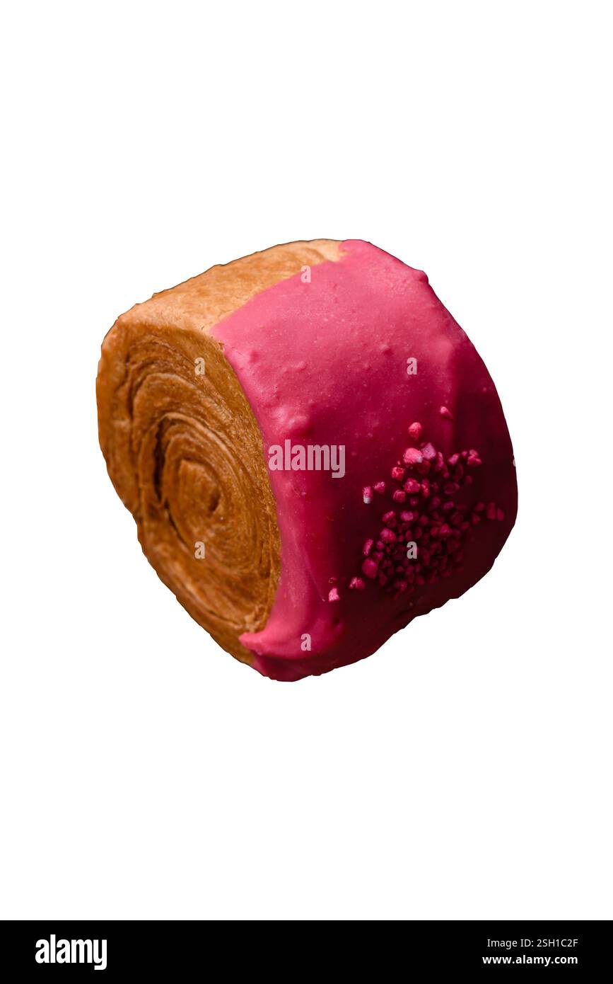 Round sweet New York roll croissant with raspberry cream filling on a ...