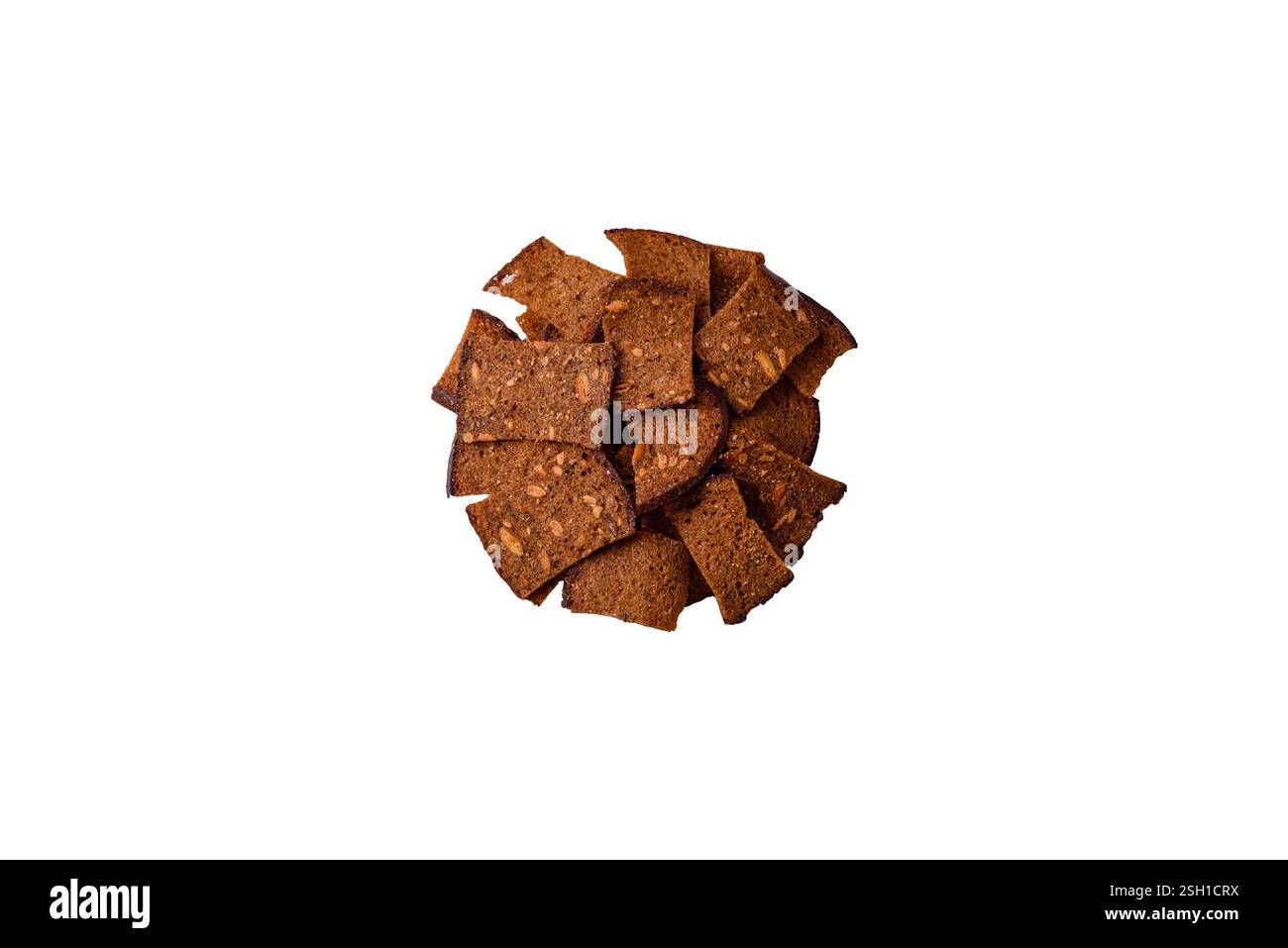 Crispy homemade brown bread chips with seeds and grains, salt, spices ...