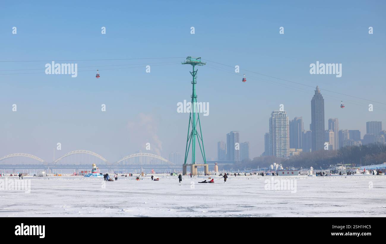 (250210) -- HARBIN, Feb. 10, 2025 (Xinhua) -- People have fun at the ...