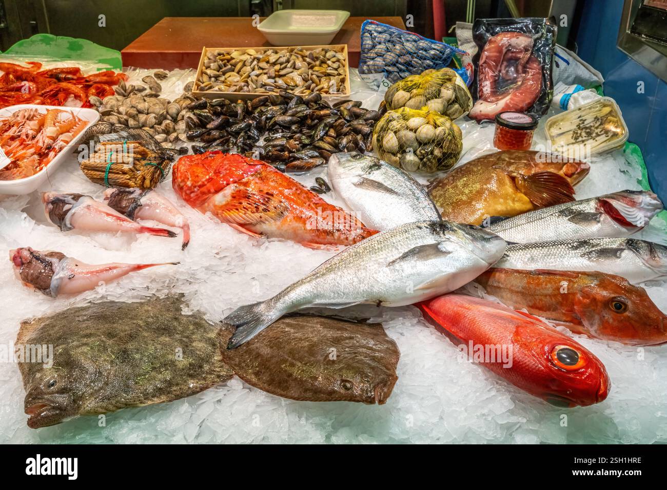 Fresh fish, seafood and crustaceans for sale at a market in Barcelona ...