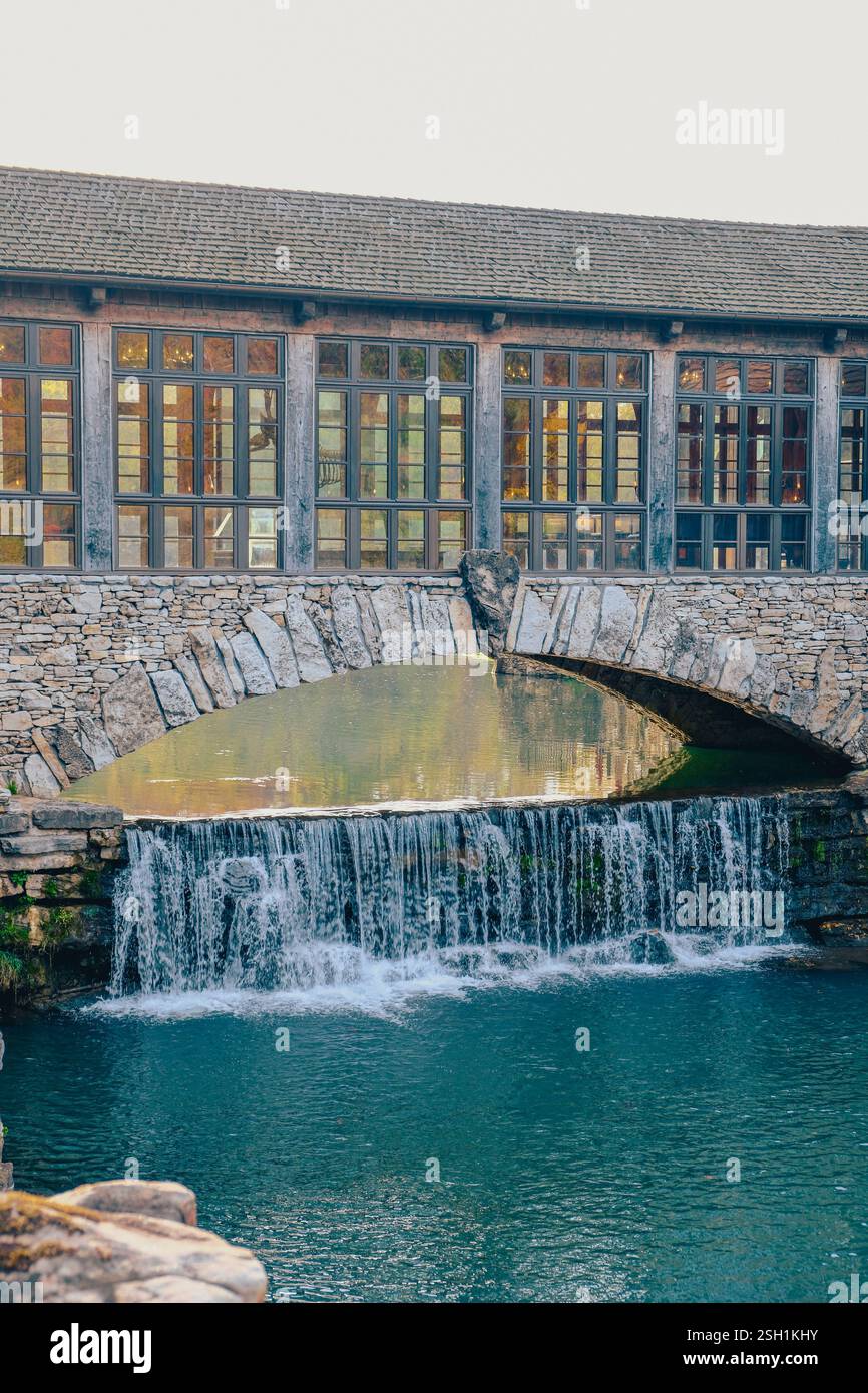 Scenic Stone Bridge Over Waterfall Stock Photo - Alamy
