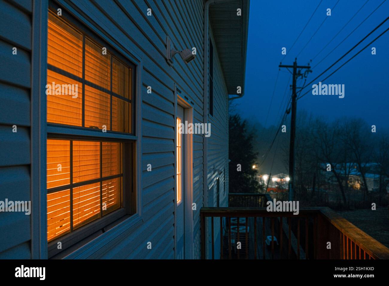 Warm Glow at Night – A Serene Suburban Twilight Window View Stock Photo ...