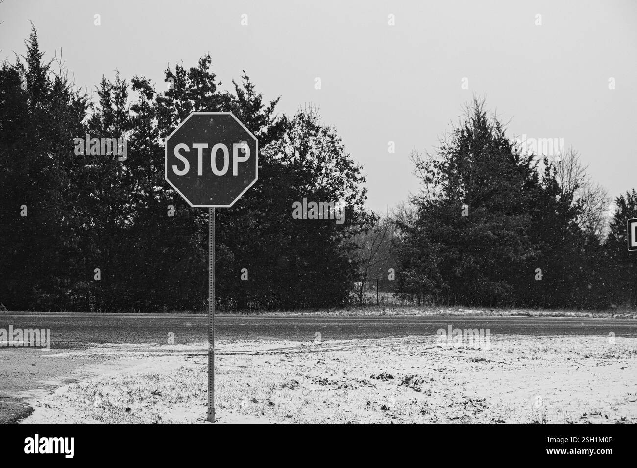 Stop Sign with Snow-Covered Ground Stock Photo - Alamy