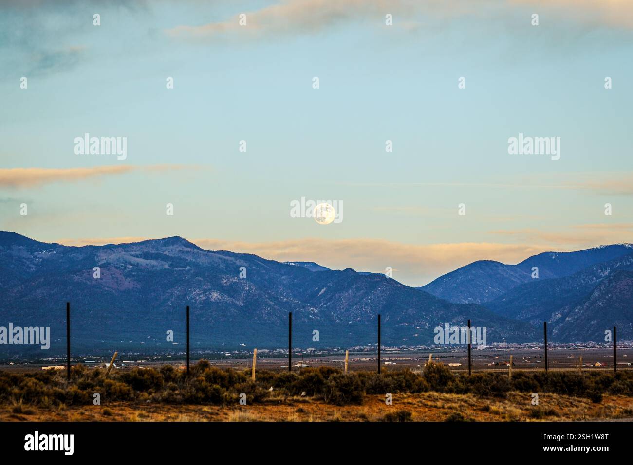 Full moon over snow capped hi-res stock photography and images - Alamy