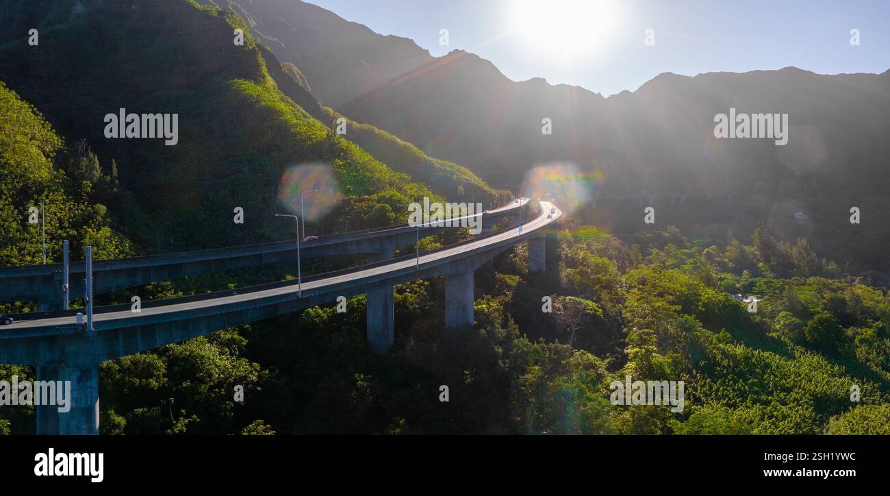 Aerial View of Elevated Highway Through Lush Mountains in Oahu, Hawaii ...
