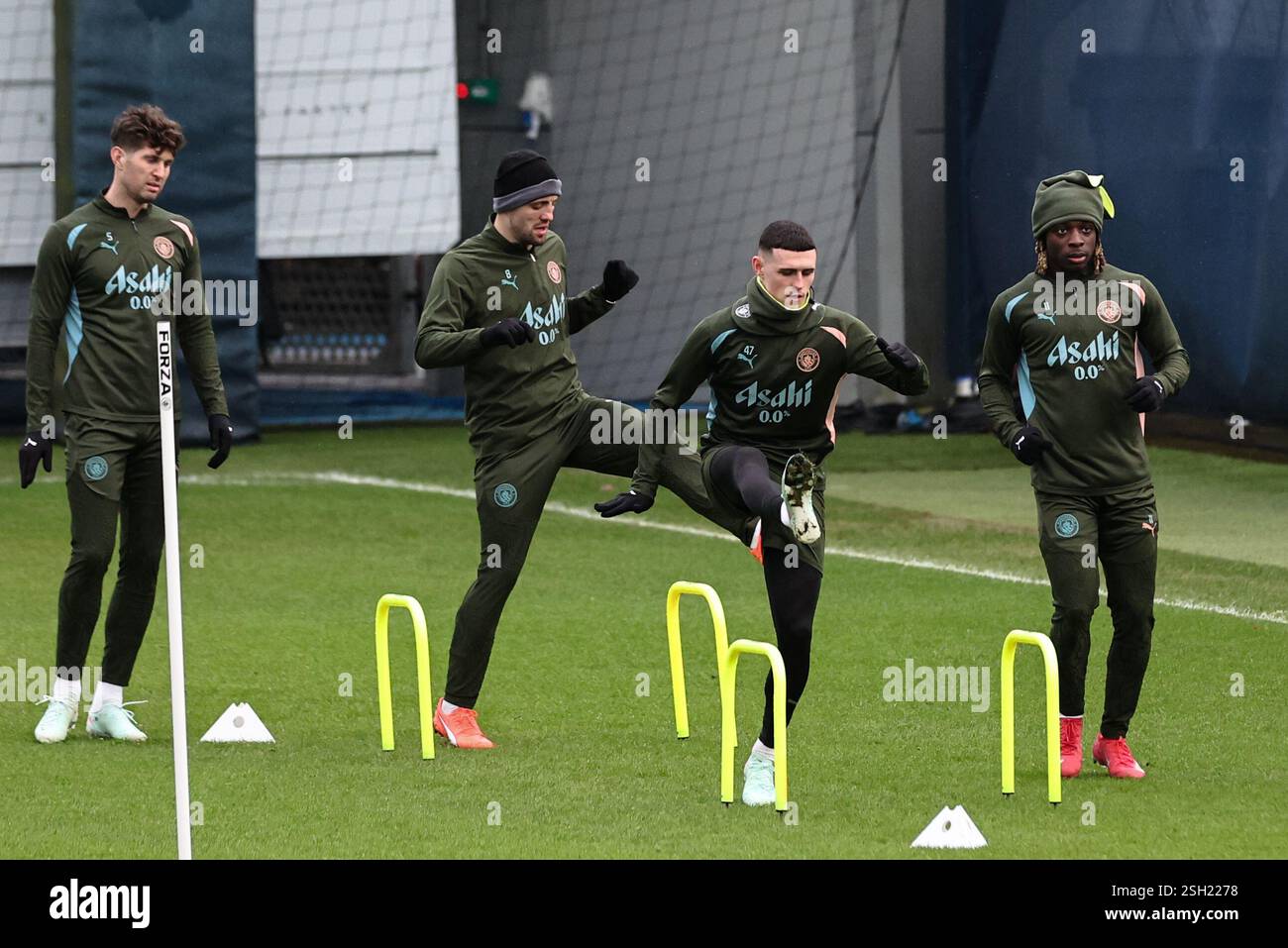 Phil Foden of Manchester City and Jérémy Doku of Manchester City during ...