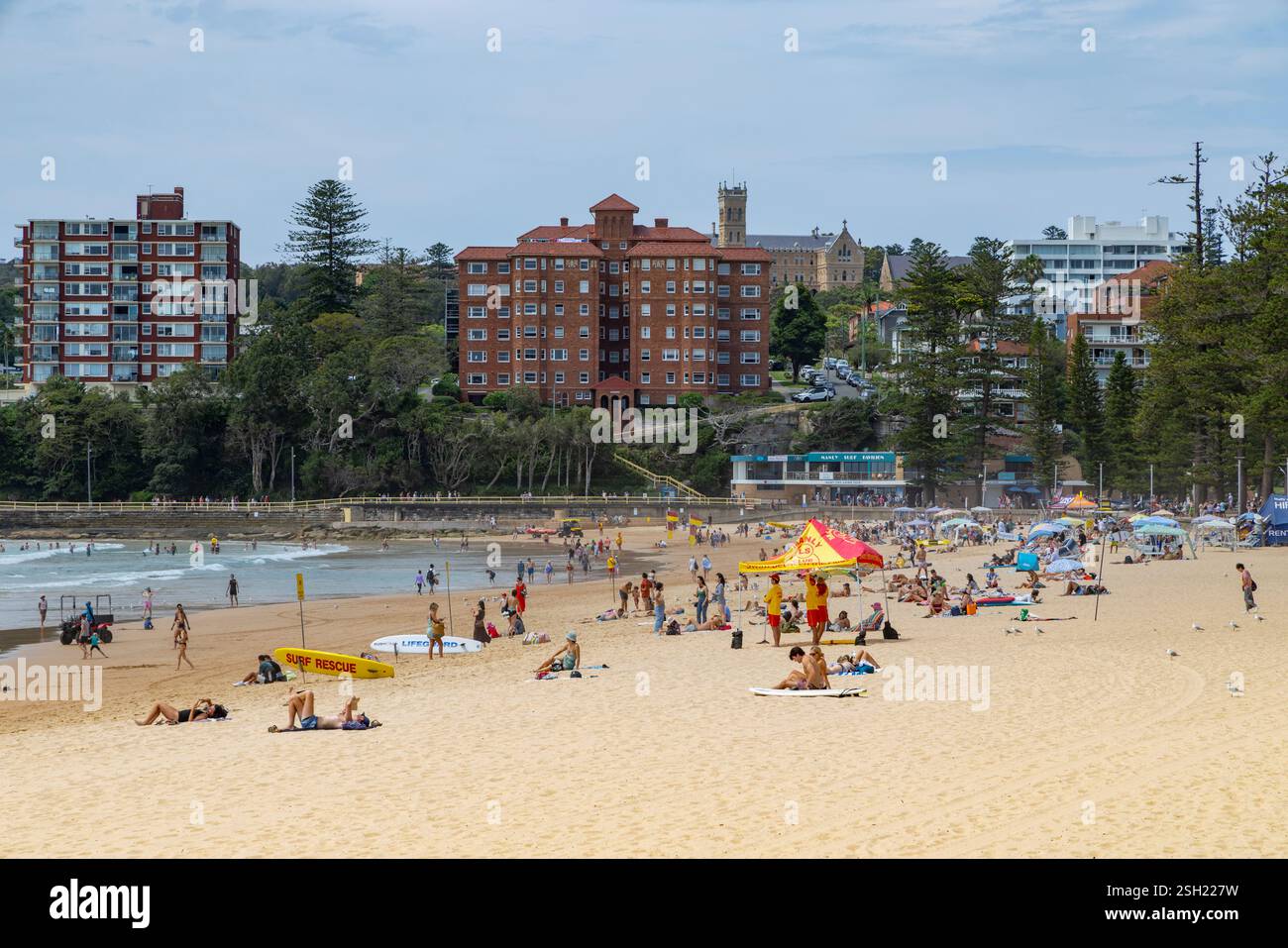 Manly Beach Sydney, people sunbathing on warm summers day, surf rescue ...