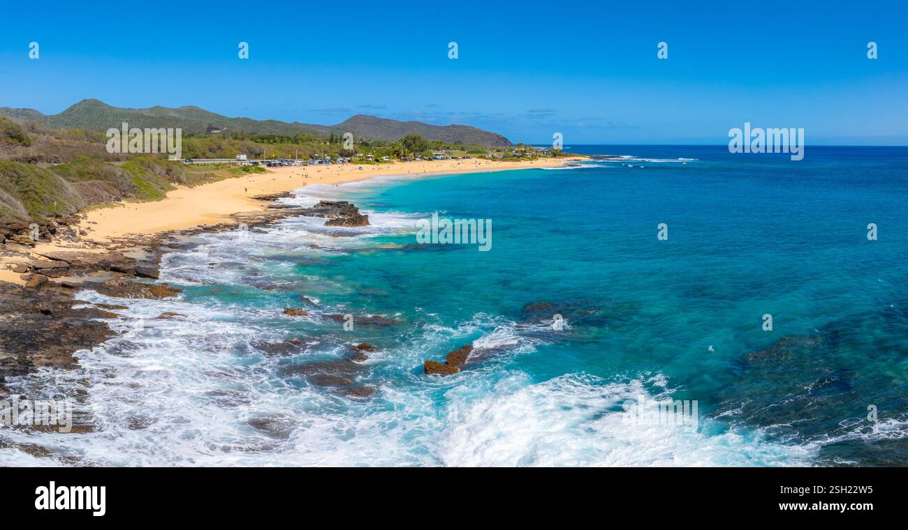 Aerial View of Oahu Beach with Rocky Outcrops and Green Hills Stock ...