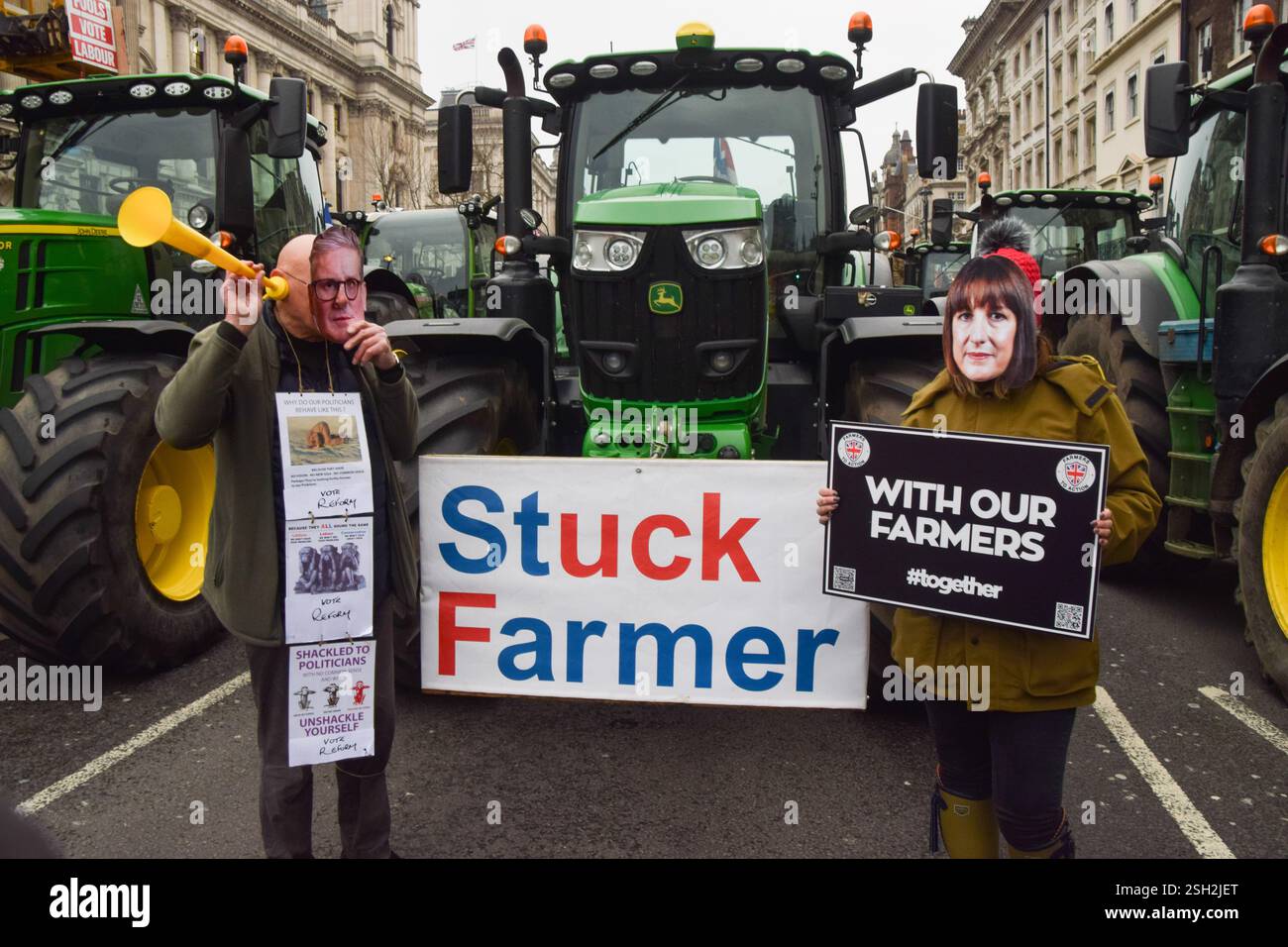 London, England, UK. 10th Feb, 2025. Protesters wear Keir Starmer and ...