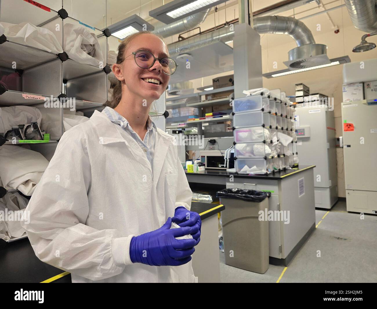 Anna Riley, a microbiology major, wraps up a day of lab work at ...
