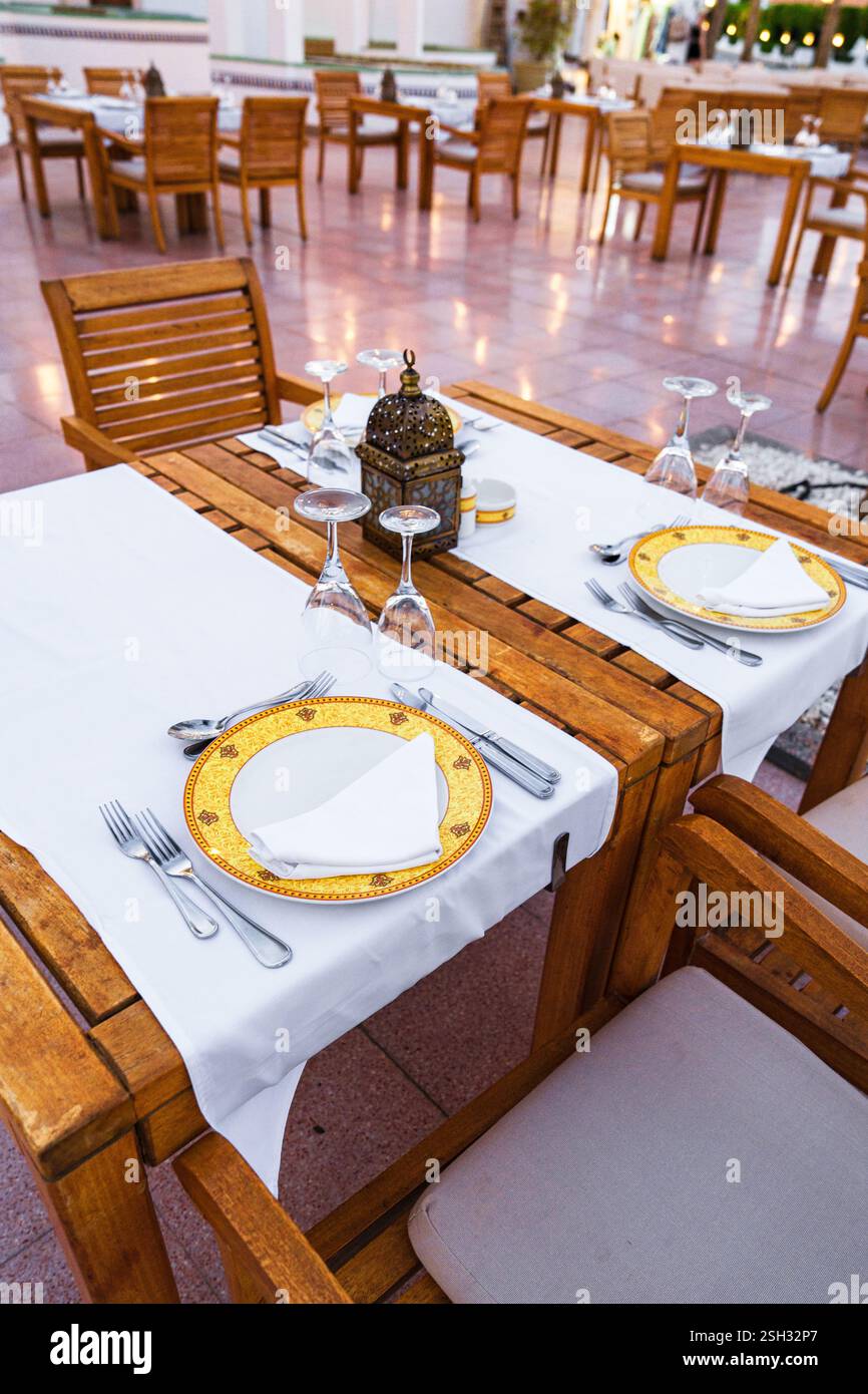 Elegant dining setup at an outdoor restaurant with beautifully arranged ...