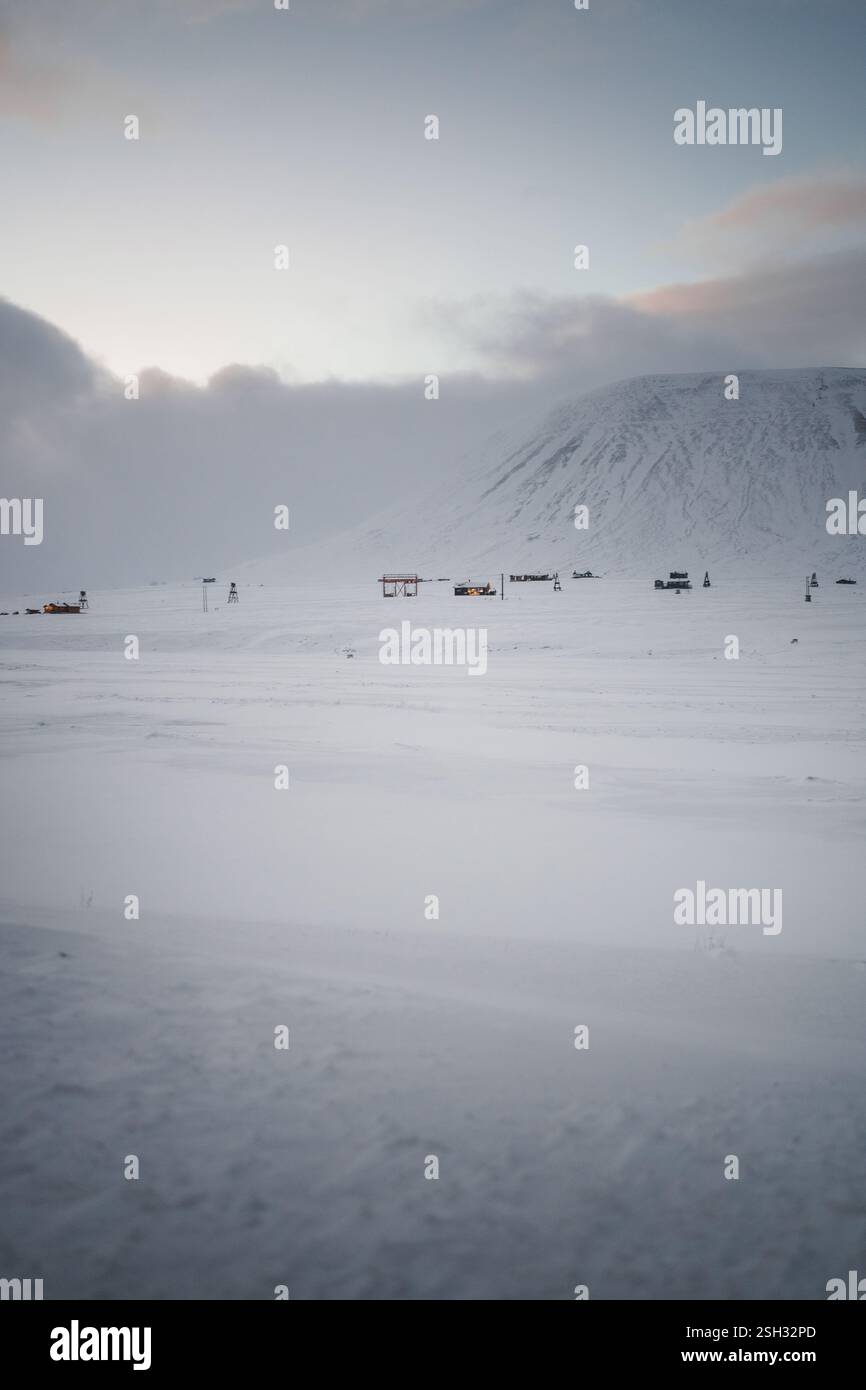 Cabins in snowy arctic valley outside Longyearbyen, Svalbard Stock ...