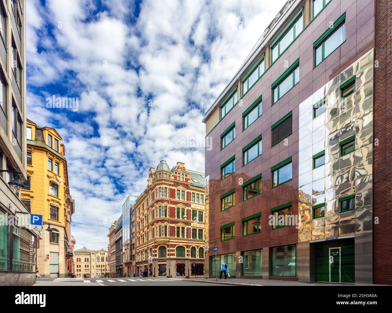 Two distinct architectural styles are visible in Tollbugata, Oslo Stock ...