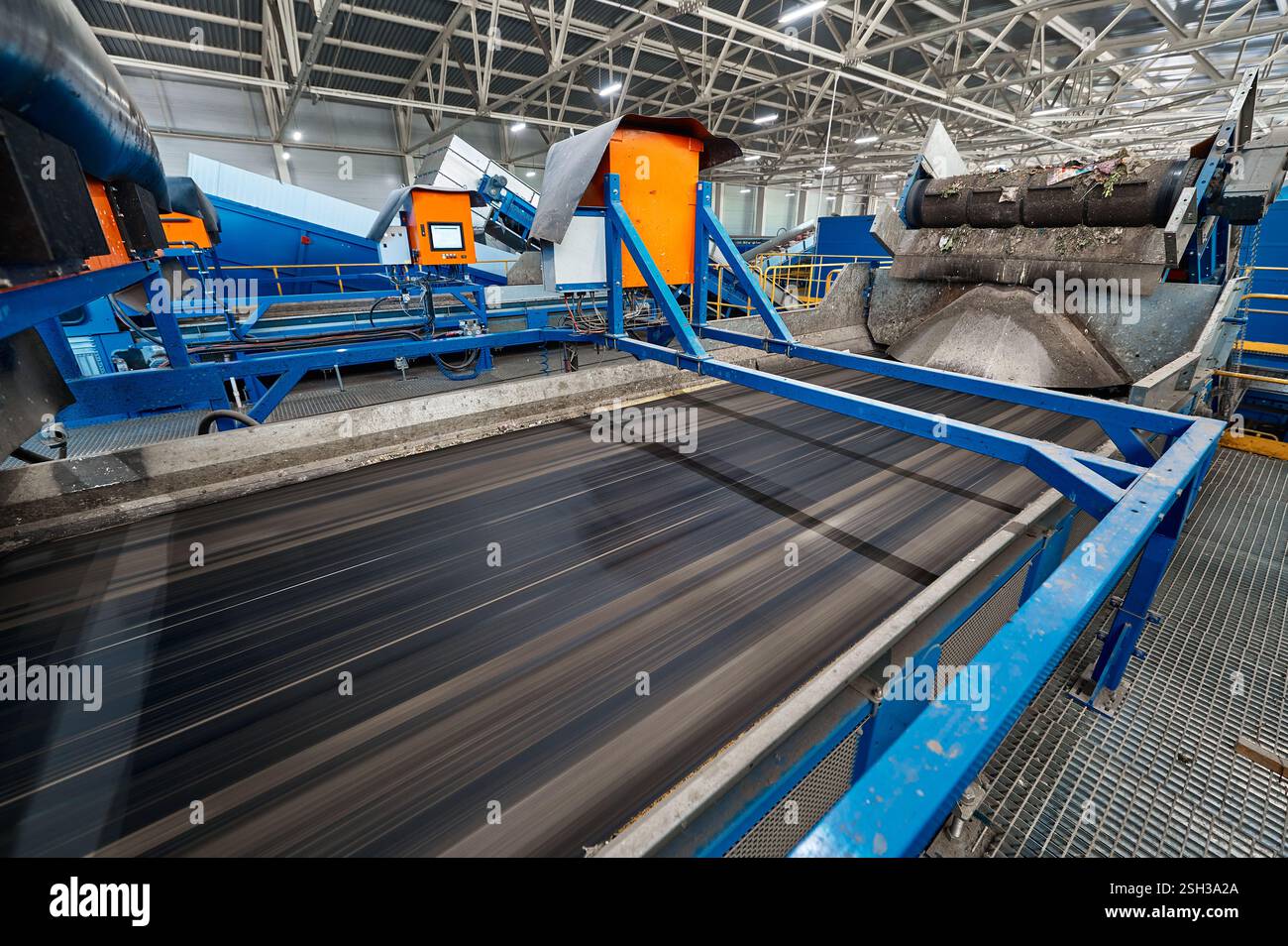 Wide belt conveyor with moving debris. Waste sorting plant Stock Photo ...