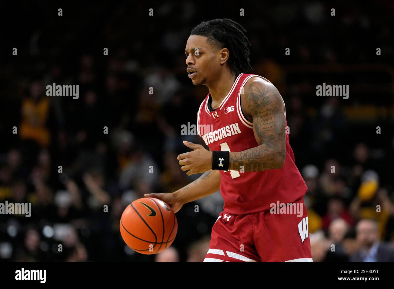 Wisconsin guard Kamari McGee drives up court during the first half of ...