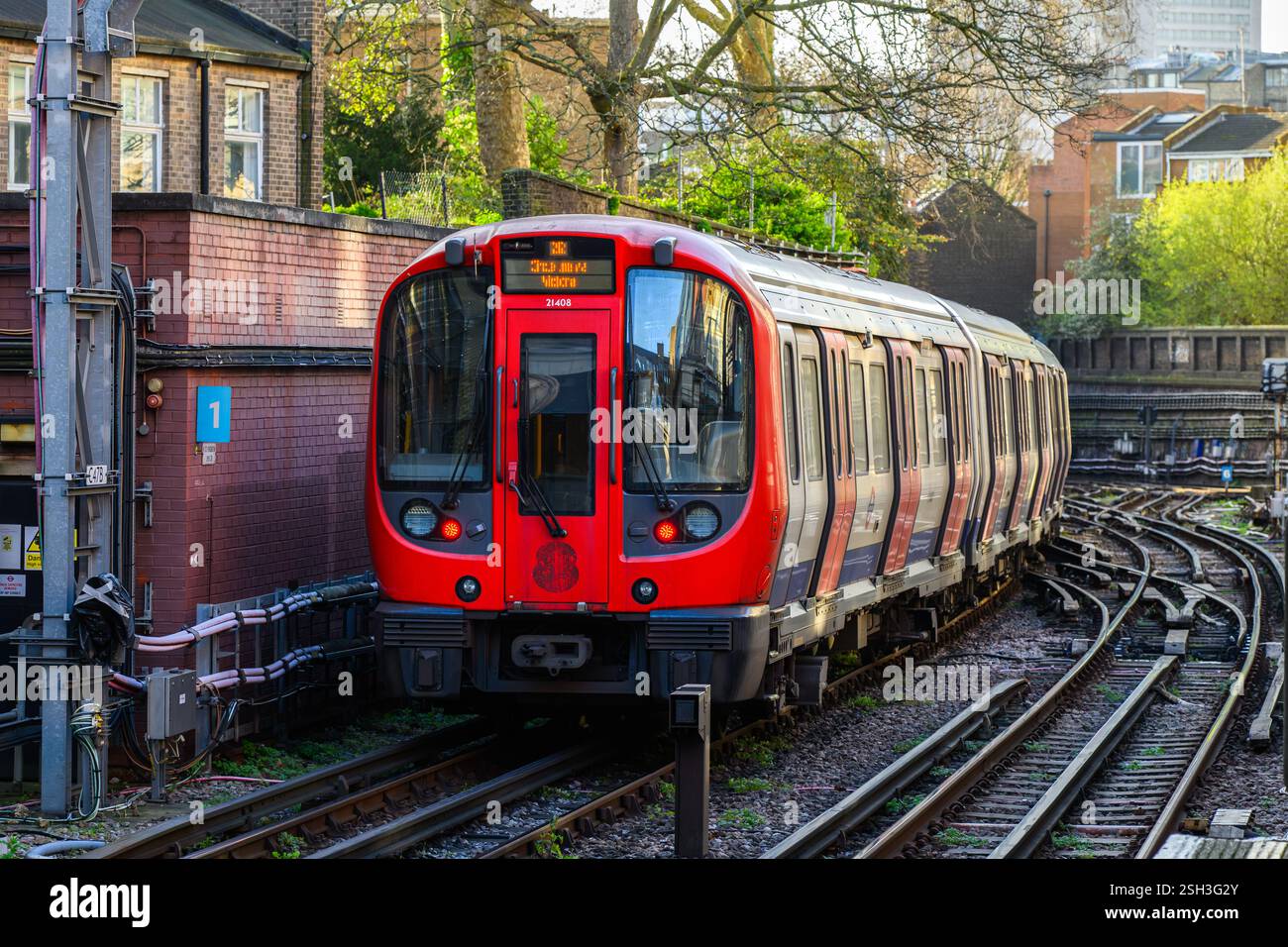 London, UK - March 23, 2024; London Underground train on tracks in ...