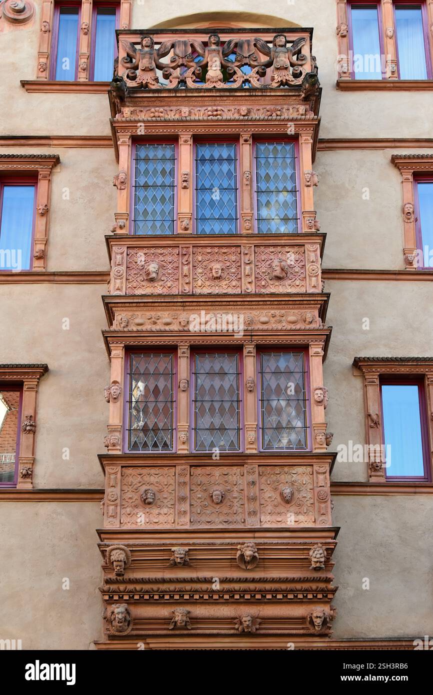 The grotesque masks decorating the oriel of the House of Heads in ...