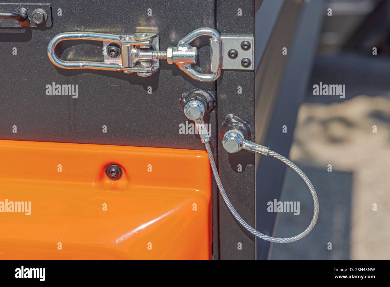Closed Latch and Safety Cable Wire at Trailer Door Stock Photo - Alamy