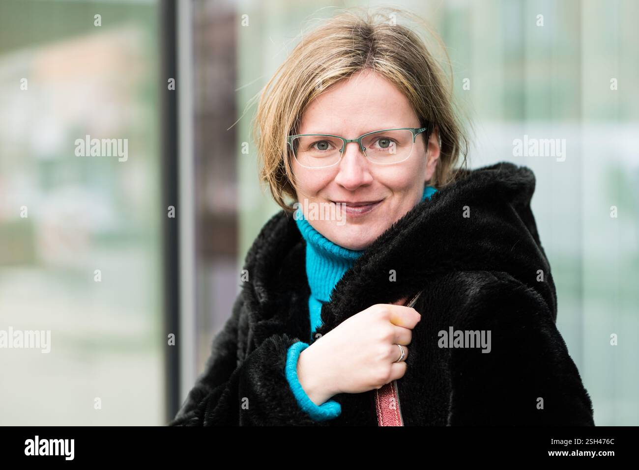 34 yo white woman posing at a business office window, Brussels, Belgium ...