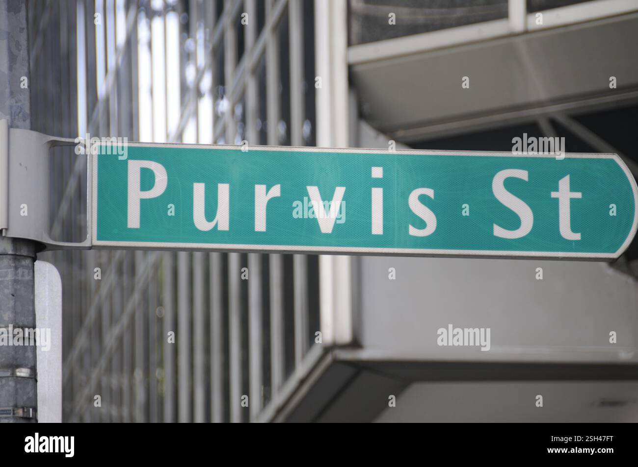A street lined with British Colonial styled buildings along Purvis ...